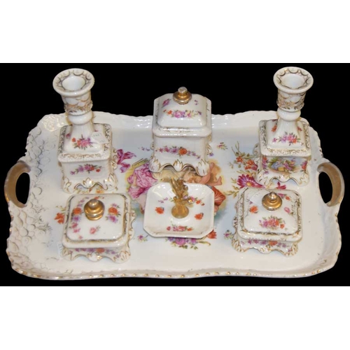 A Seven Piece Porcelain Dressing Table Set