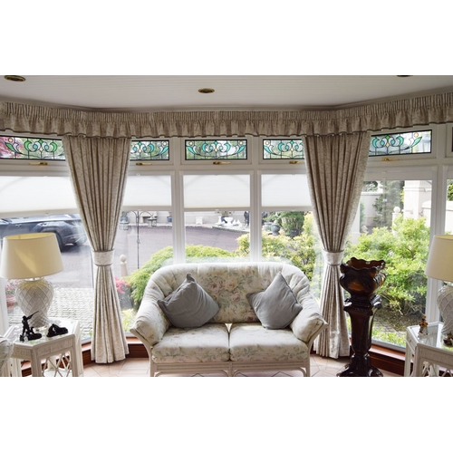 The Entire Fitted Full Length Curtains in The Conservatory