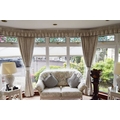 The Entire Fitted Full Length Curtains in The Conservatory