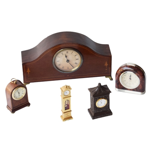 An Early Mantle Clock and Four Modern Mantle Clocks