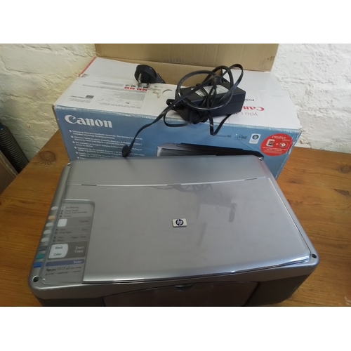 Canon hp printer and pro action strip cut paper shredder. Comes in ...