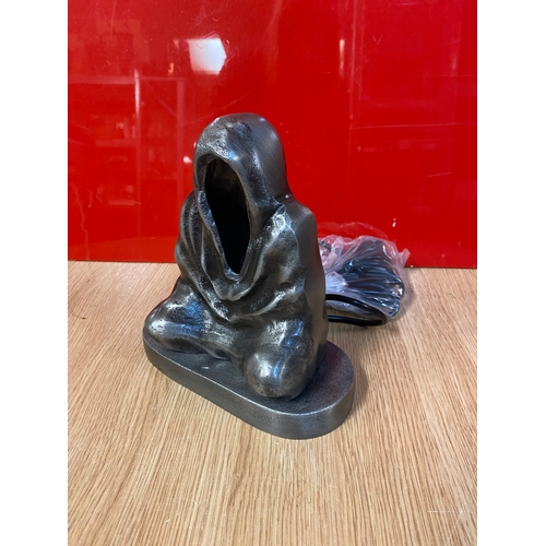 Cast Aluminium Hollow Man Lamp