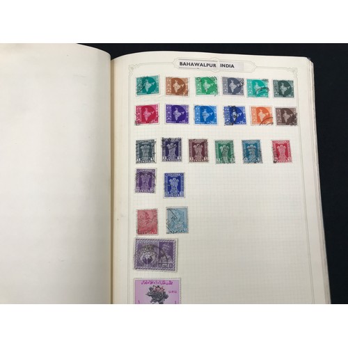 Simplex stamp album, part filled world stamps.