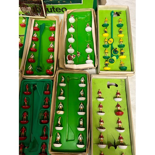 A collection of twenty-one vintage 00 scale Subbuteo teams comprising ...