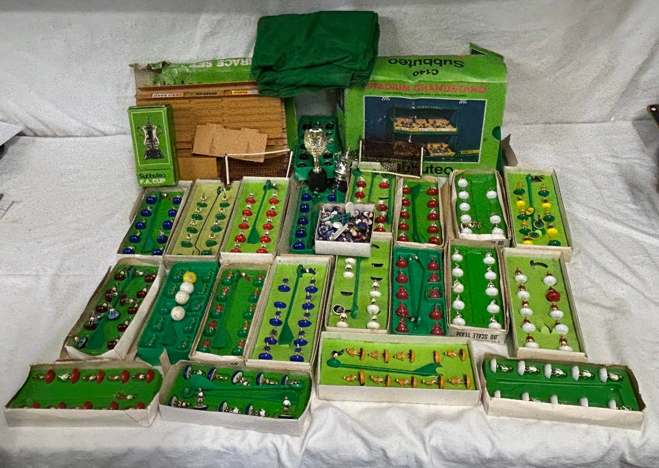 A collection of twenty-one vintage 00 scale Subbuteo teams comprising ...