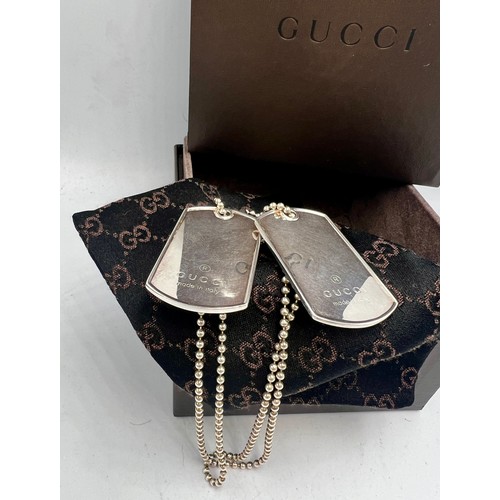 A Gucci dog tag .925 silver necklace with original pouch and ...