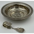 A white metal bowl 23cm d marked 'Sterling Silver' B63 with indistinct ...