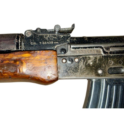 Kalashnikov 7.62mm AKM assault rifle and fitted magazine, serial number ...
