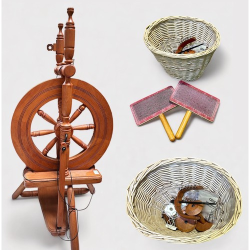 A modern stained-beechwood wool-spinning wheel