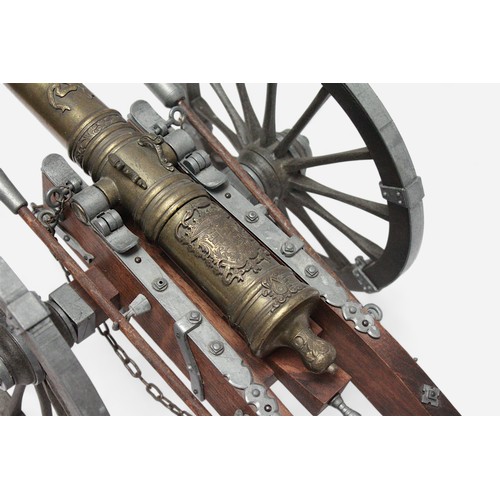 A scale model of a 19th Century French Muzzle-Loading Cannon, on two ...