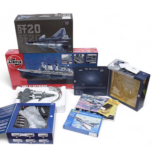 A collection of assorted boxed scale model die-cast military aircraft ...