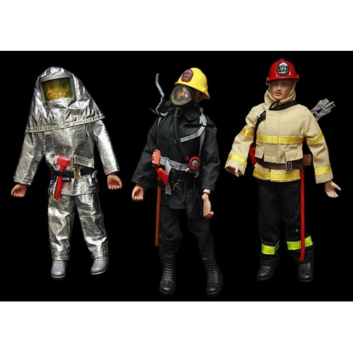 A group of three Palitoy Action Man flock hair firefighter figures ...