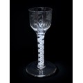A mid 18th century wine glass with ogee shaped bowl engraved with a ...