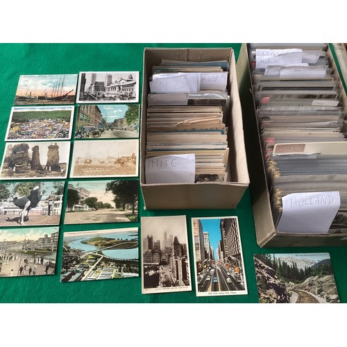 Two boxes with several hundreds standard-size foreign postcards, with ...