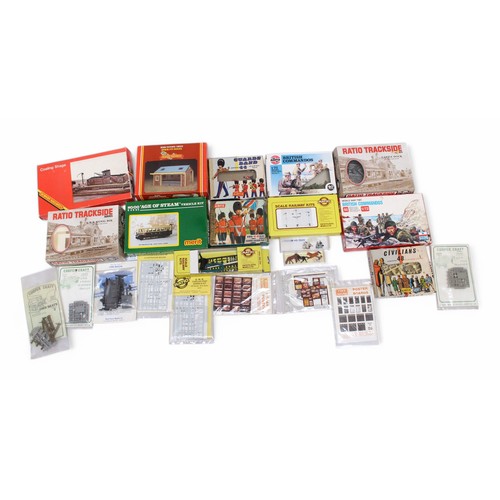 A collection of plastic model build kits and figures, relating to ...