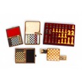 Four assorted travel chess sets, each with fitted cases and boxes ...