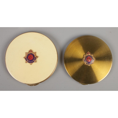 Two powder compacts bearing Royal Army Service Corps. badges, one ...
