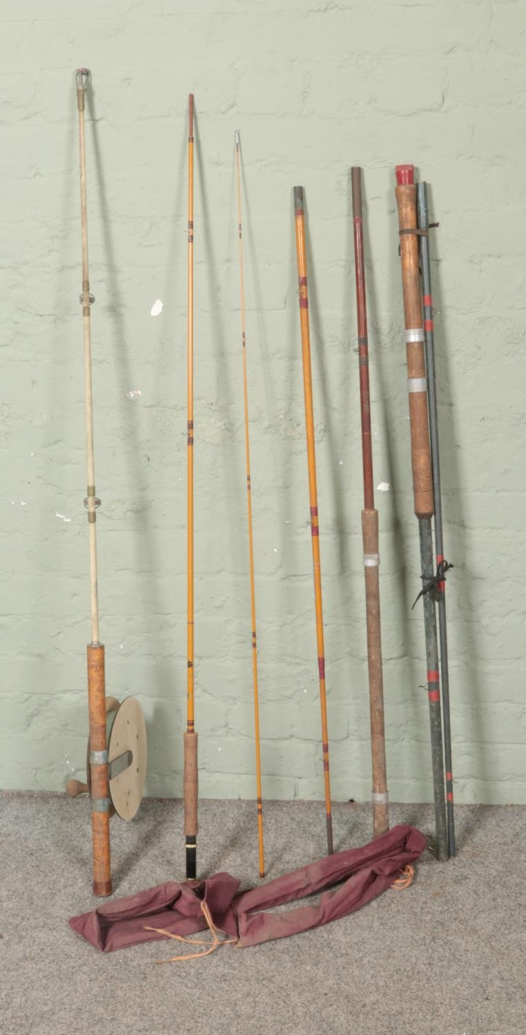 A collection of assorted vintage fishing rods to include Milbro Tackle ...