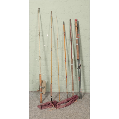 A collection of assorted vintage fishing rods to include Milbro Tackle ...