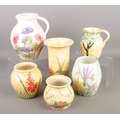 Six Radford pottery vases, all with hand painted floral decoration ...