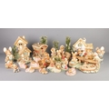 A large quantity of Pendelfin rabbit figures and houses, to include log ...