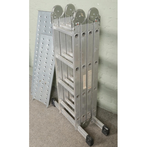 A folding aluminium multi function extending step ladder with steel platform inserts, EN131.