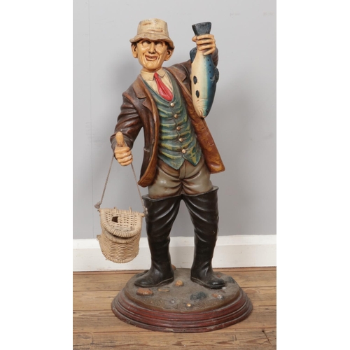 A Peter Mook's "Season's Best" resin statue, with basket and signed at ...
