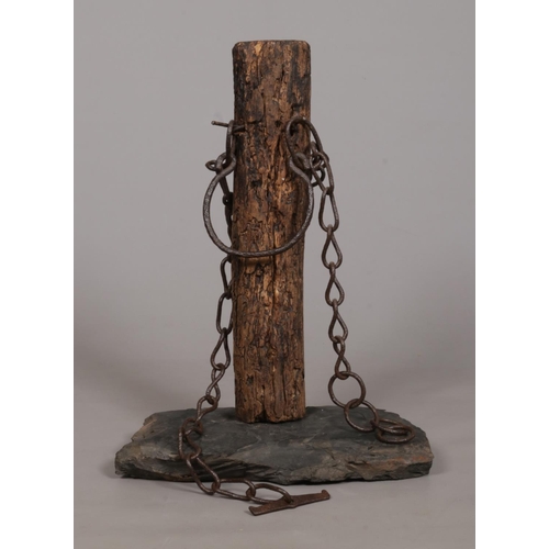 A set of antique iron neck shackles, purportedly used during the witch ...