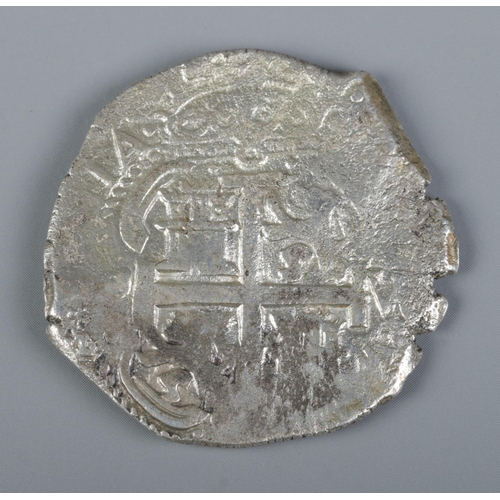 A Spanish 'Piece of Eight' 8 reales coin recovered from the wreckage of ...