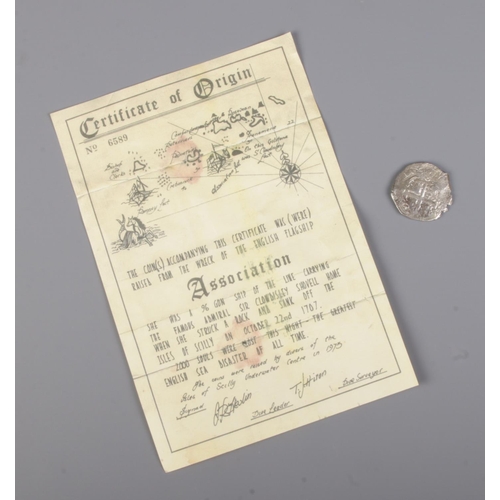 A Spanish 'Piece of Eight' 8 reales coin recovered from the wreckage of ...