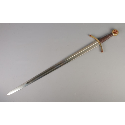 A modern reproduction Knights Templar sword. Blade length: 78cm. CANNOT ...