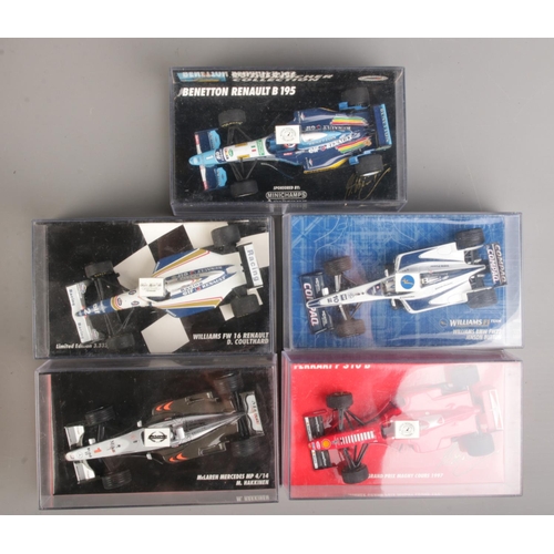 Thirteen boxed 1:43 Scale diecast model Formula One racing cars. All by ...