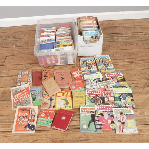 Two boxes of assorted sporting ephemera to include 1920 edition of the ...