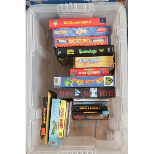 An Atari 520-ST video games console along with a good quantity of games ...