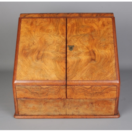 An early Twentieth Century burr walnut and oak desk tidy, with fitted ...