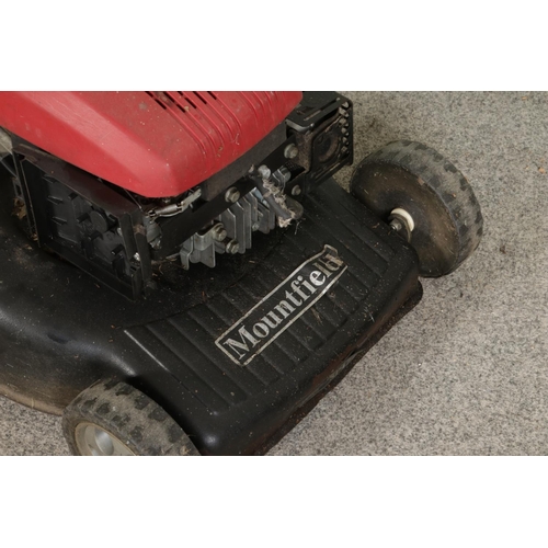 A Mountfield RV40 150cc petrol lawnmower.