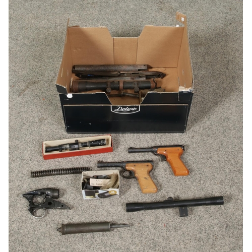 A box of assorted air rifle spares and items for repair, to include ...