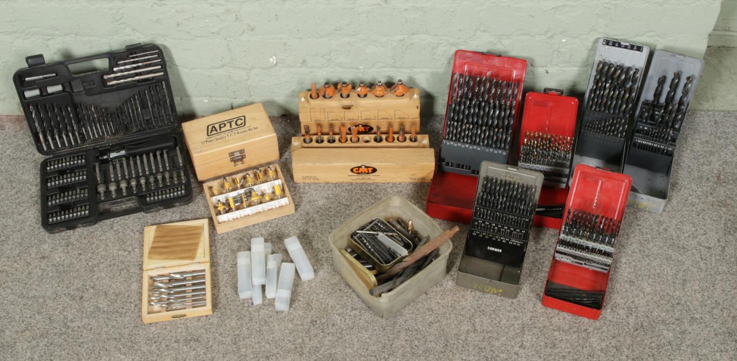 A large collection of Draper and Dormer drill bit sets in metal ...