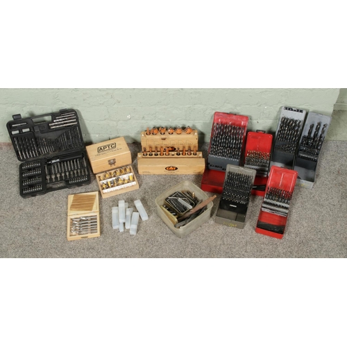 A large collection of Draper and Dormer drill bit sets in metal ...