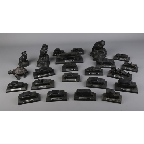 A good collection of E & J Collectables Ltd coal made models of cars ...