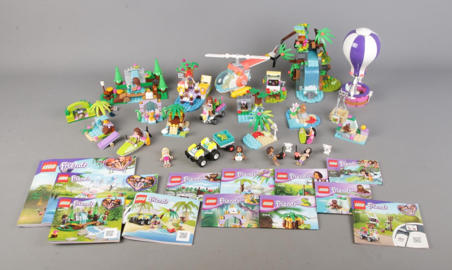 A collection of completed Lego sets all from the Lego Friends series to ...