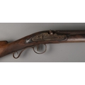 An antique percussion rifle with engraved lock plate along with a ...