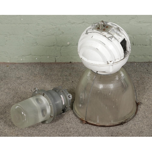 Two industrial ceiling lights including a Holophane Lighting and ...