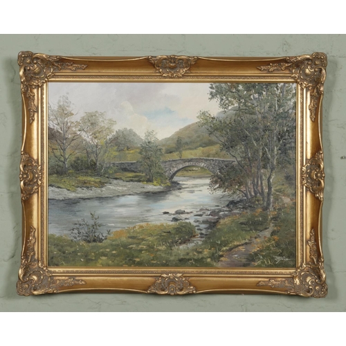 Denys Garle (British, Twentieth Century); An oil on canvas of a river ...