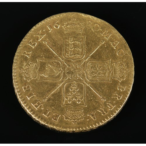 A Charles II five guineas gold coin, dated 1680. 41.56g.
