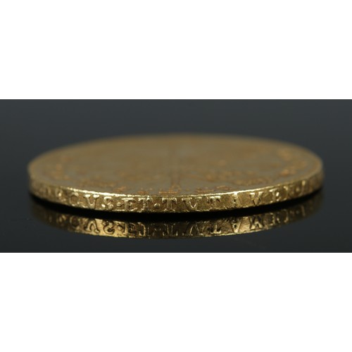 A Charles II five guineas gold coin, dated 1680. 41.56g.
