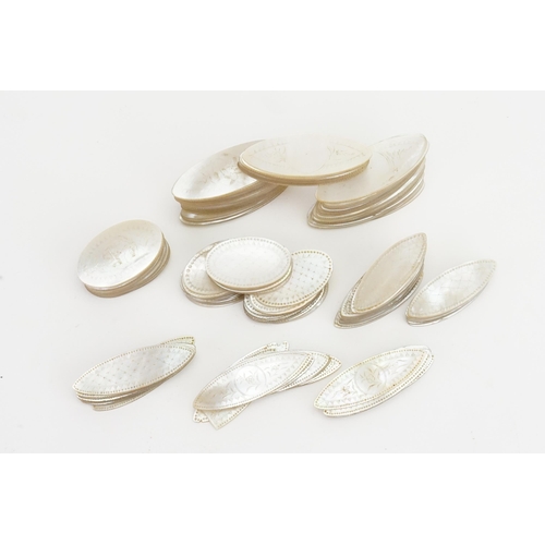 A collection of Chinese engraved mother of pearl gaming tokens ...