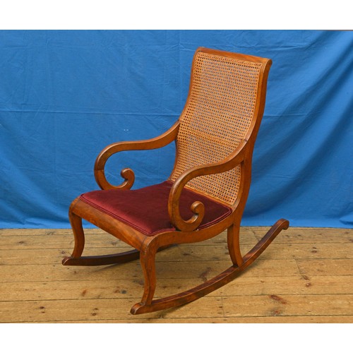 A Victorian Mahogany Framed Cane Back Rocking Chair with Swan Neck Arms ...