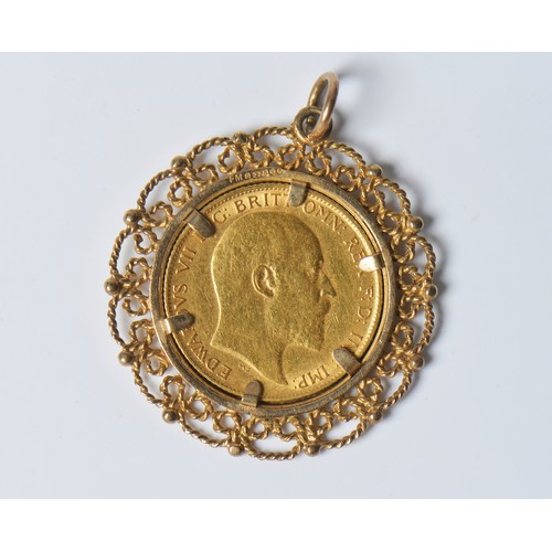 A "Edward VII" 1905 Half Gold Sovereign in a 9ct Gold mount. Total ...