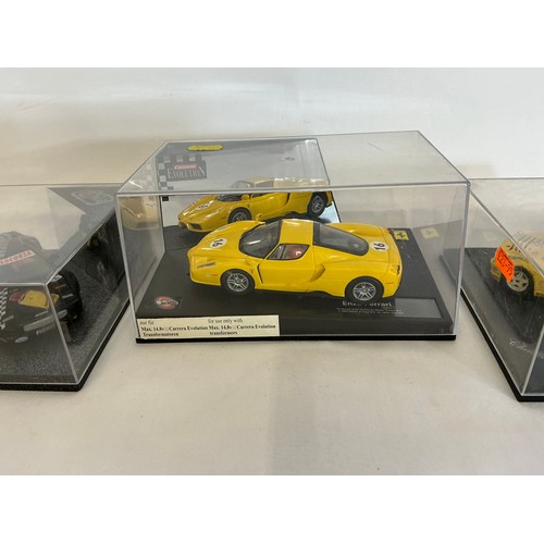 A Carrera Evolution "Enzo Ferrari" in Yellow, a Proslot "Ferrari 355 ...